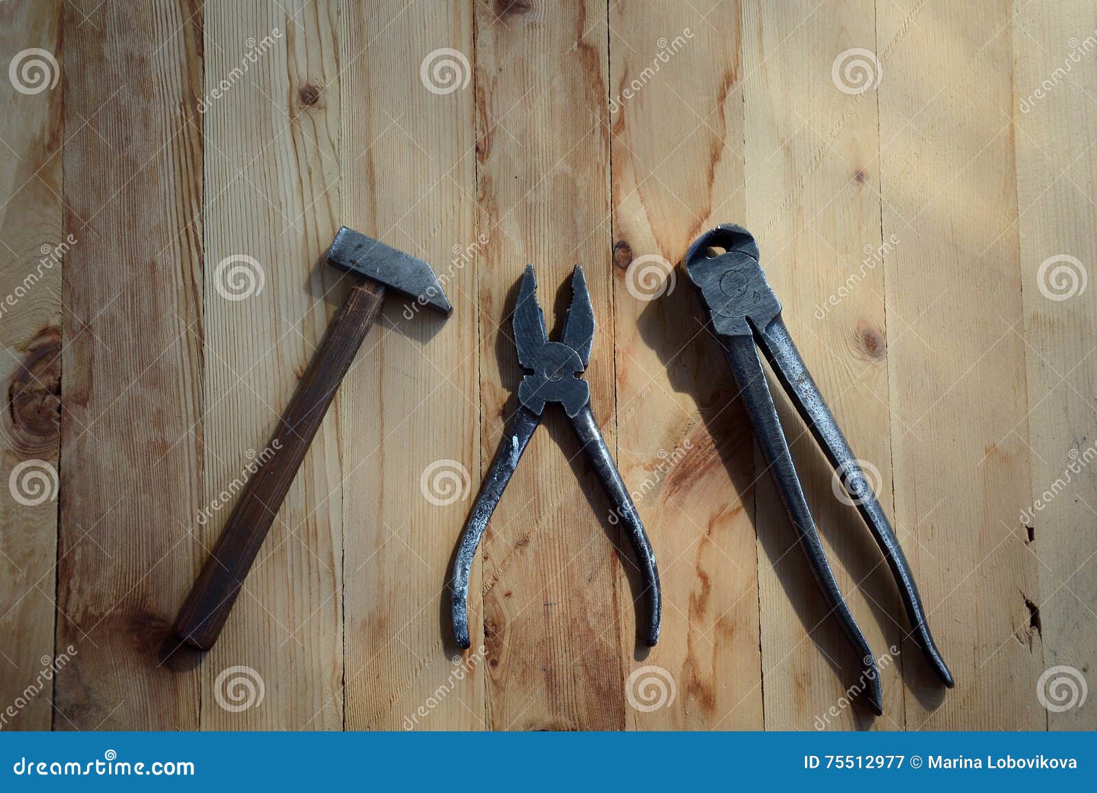 Three Tools on a Wooden Background Stock Image - Image of instrument ...