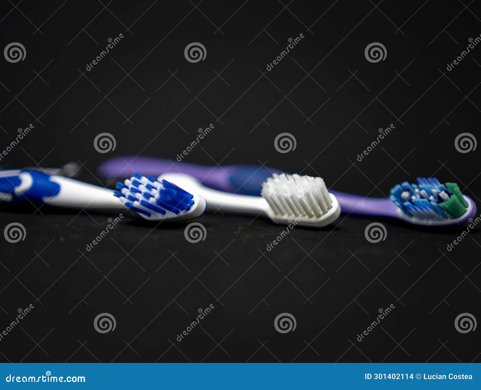 Three Toothbrushes of Different Color Stock Photo - Image of healthy ...