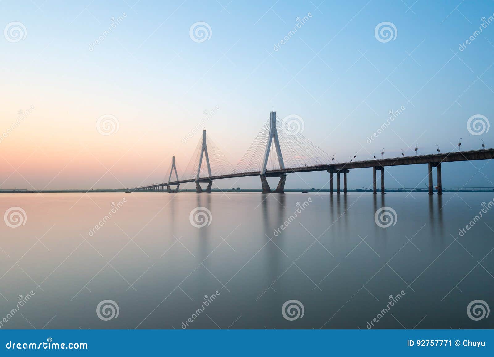 Three Towers of Cable-stayed Bridge Stock Image - Image of dusk ...