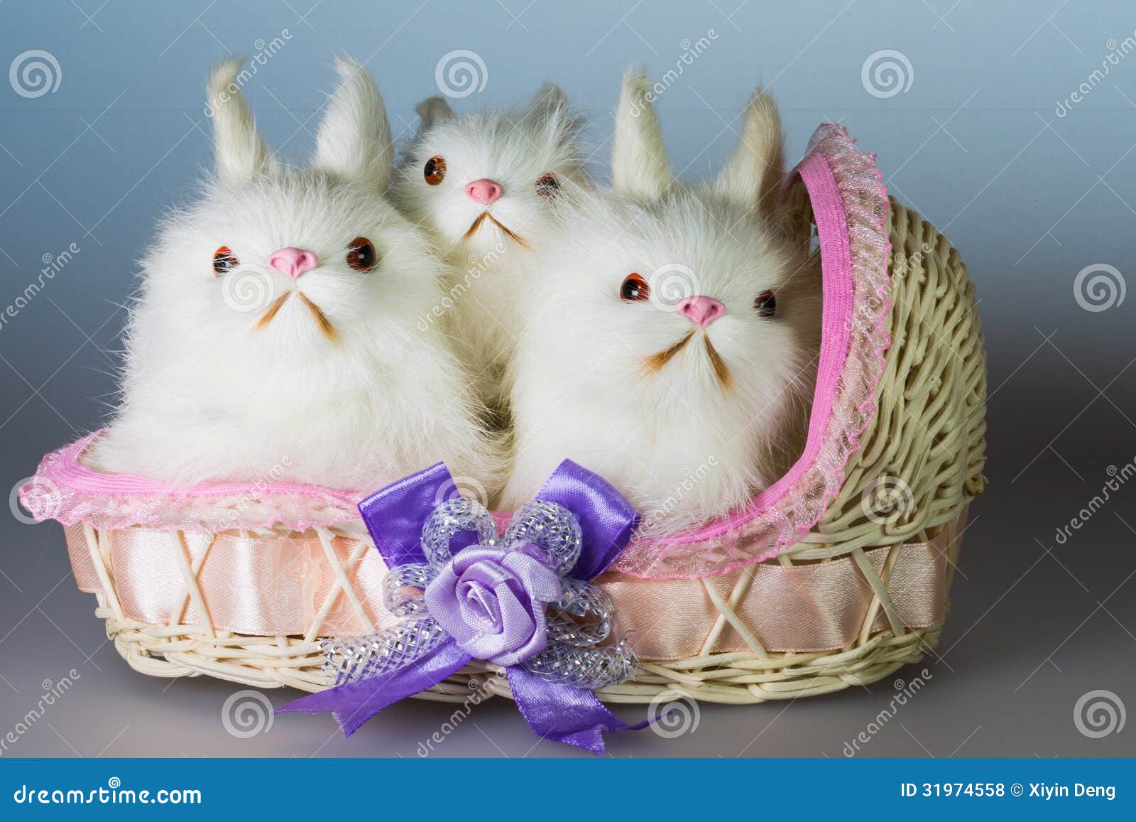 Three Toy Rabbits in a Basket Stock Photo - Image of childhood, gift ...