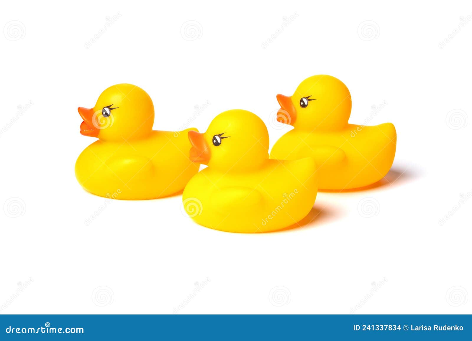 Three Toy Yellow Rubber Ducks for Swimming, Isolated on a White ...
