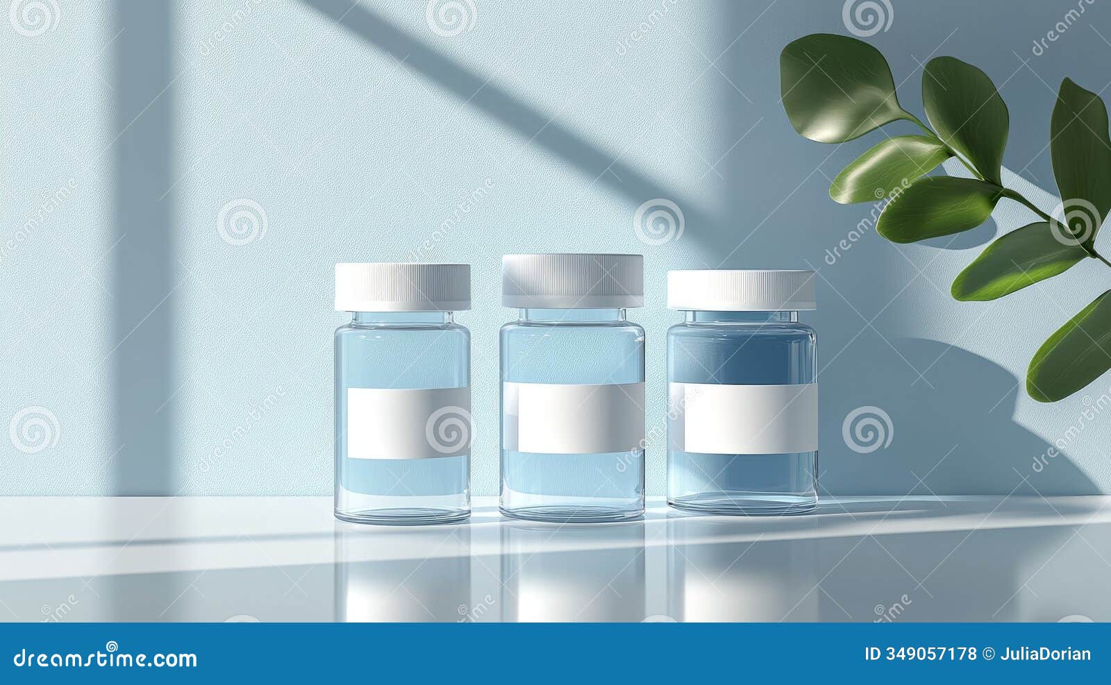 Three Transparent Glass Vials with Blank White Labels on Reflective ...
