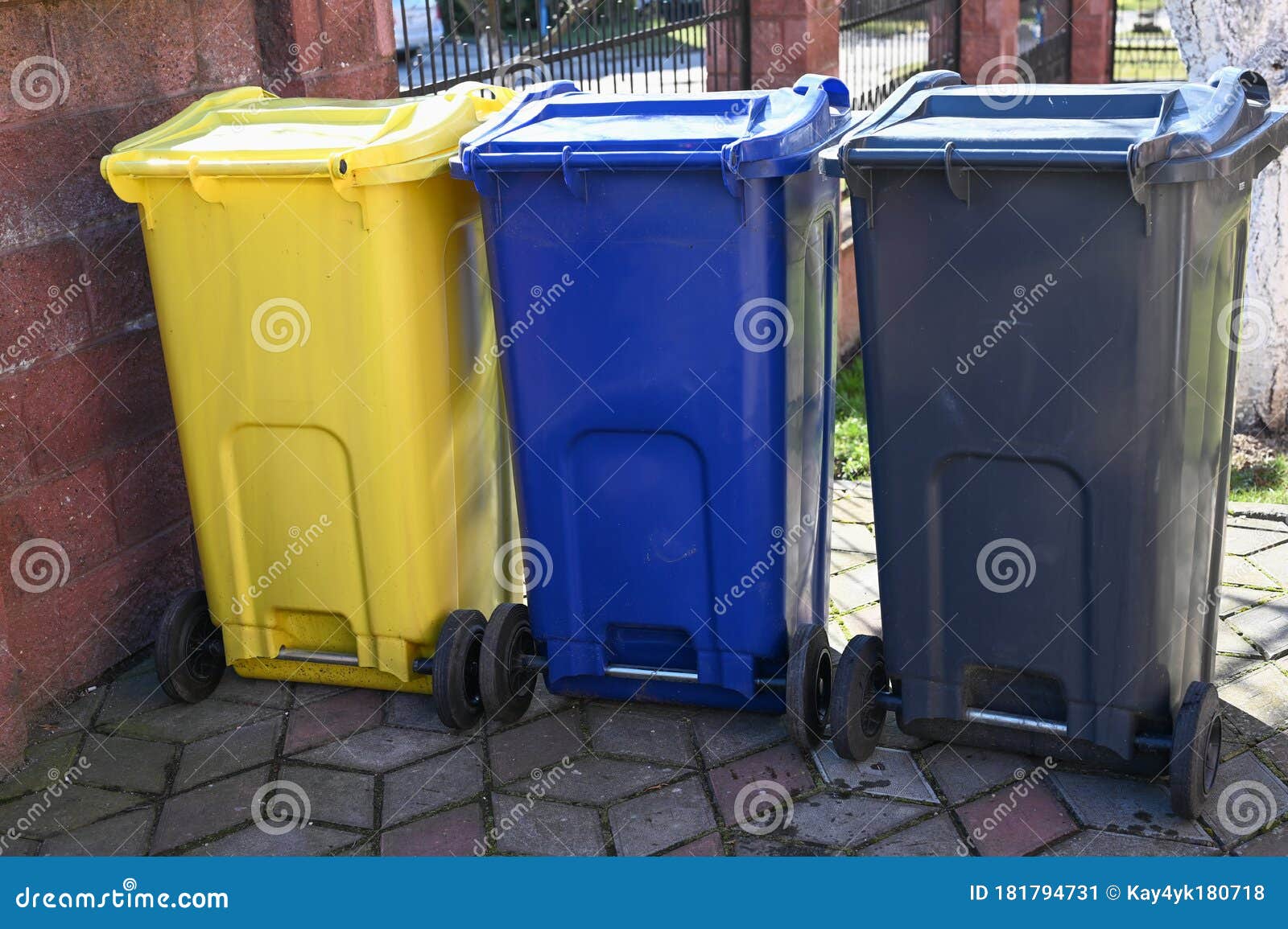 Three Trash Bins for Separate Waste Stock Image - Image of color ...