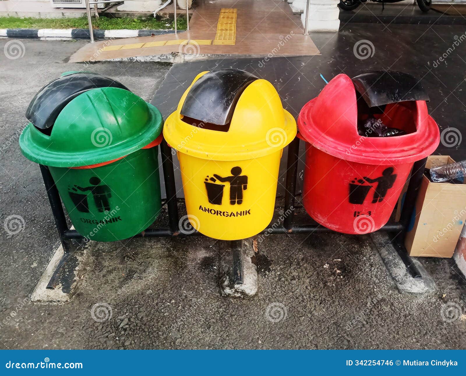 Three Trash Cans of Different Colors Stock Photo - Image of colorful ...