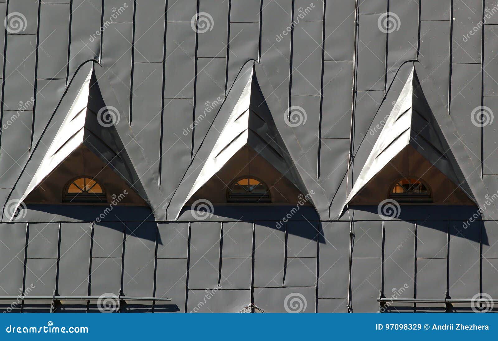 Three Triangular Attic Windows in a Metal Roof Stock Image - Image of ...