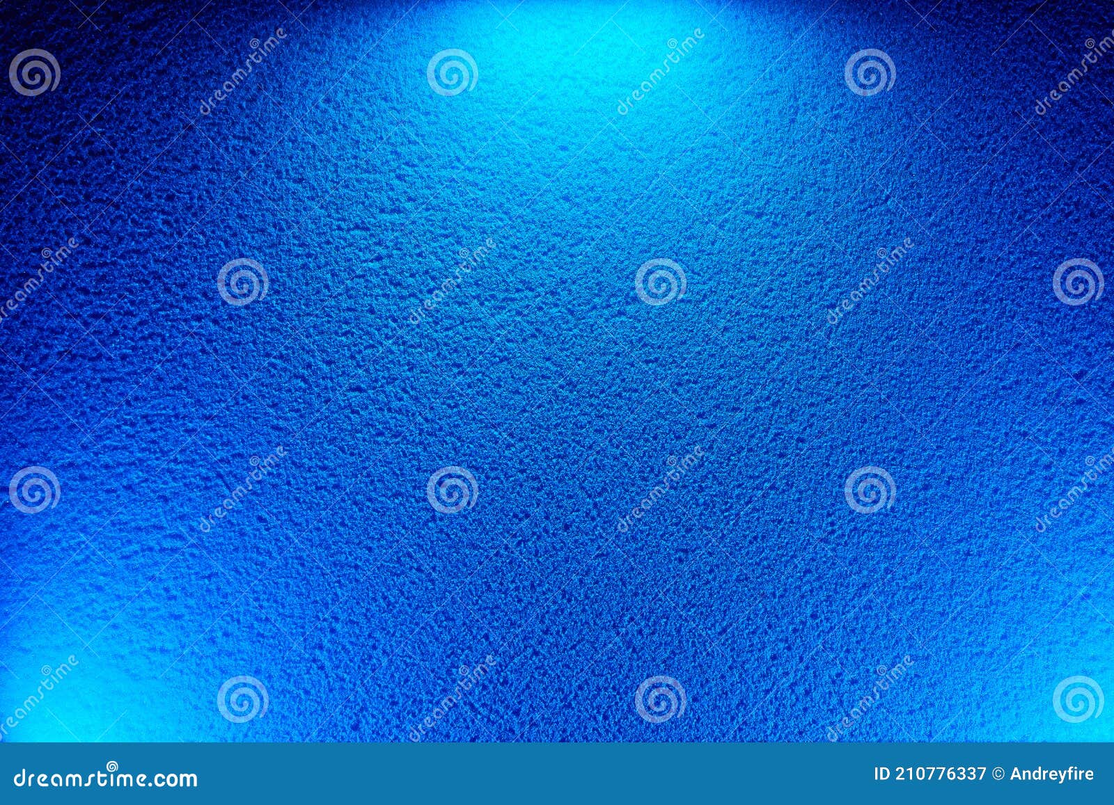 Three Turquoise Rays of Light Illuminate a Bright Blue Textural ...