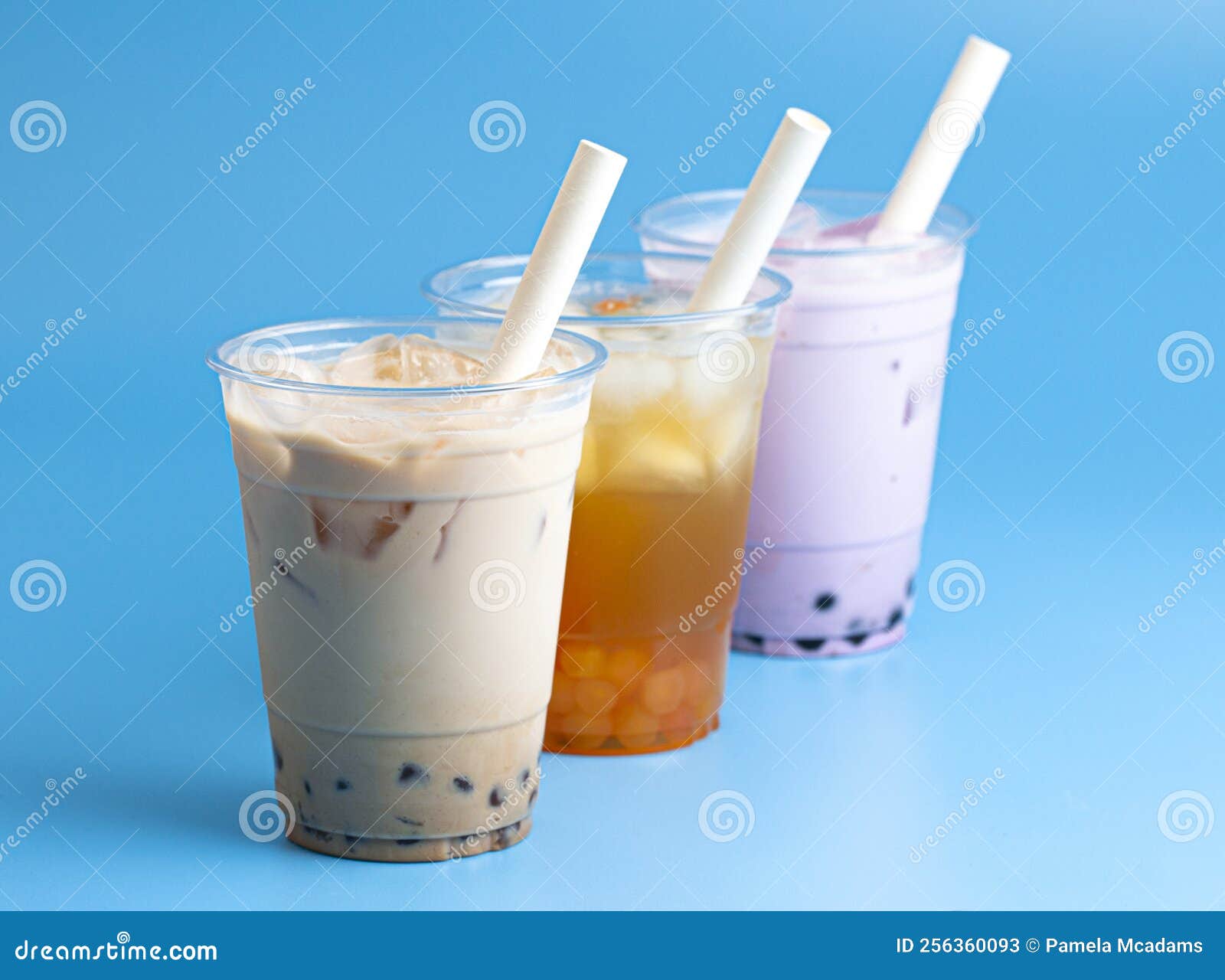 Three Different Types of Boba Tea on a Bright Blue Background Stock ...