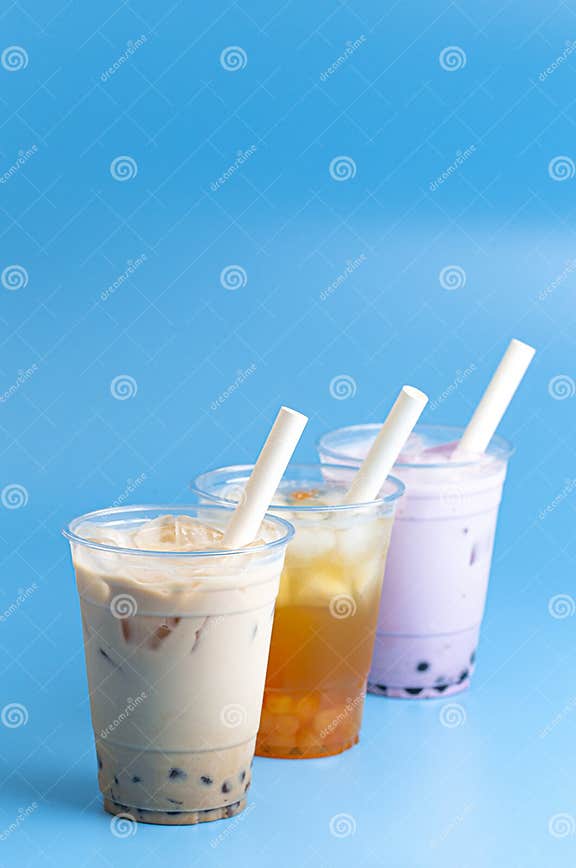 Three Different Types of Boba Tea on a Bright Blue Background Stock ...