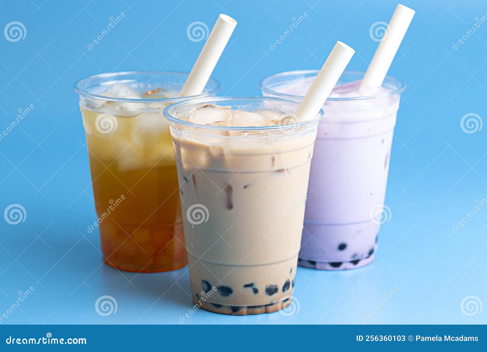 Three Different Types of Boba Tea on a Bright Blue Background Stock ...