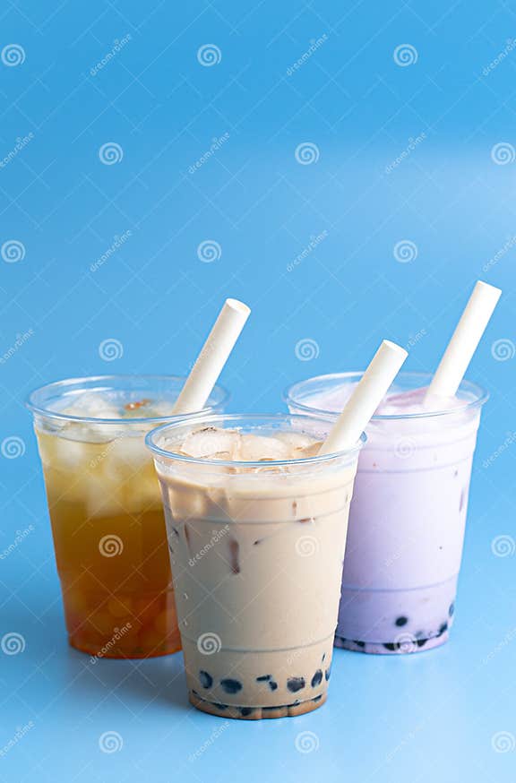 Three Different Types of Boba Tea on a Bright Blue Background Stock ...