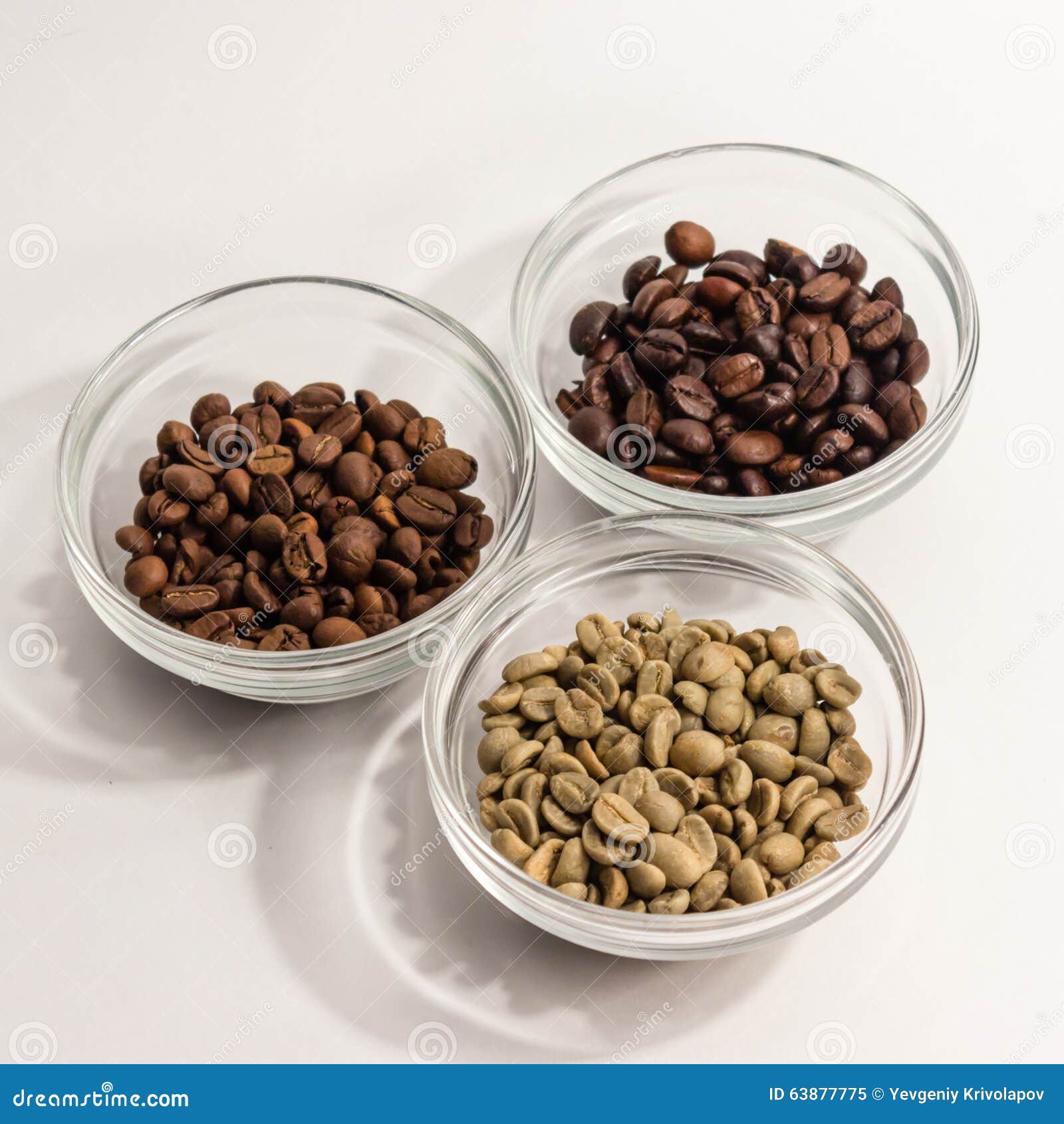 Three Types of Coffee in Glass Shelves Placed in a Triangle on a Stock ...
