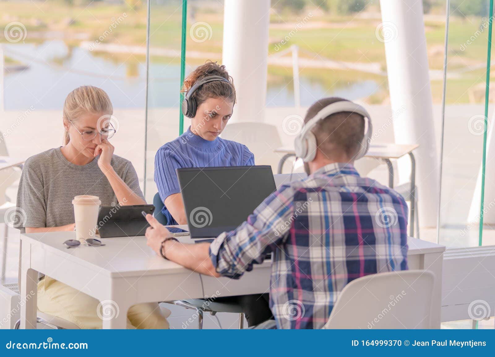 Three University Students in Coffee Shop Stock Photo - Image of ...