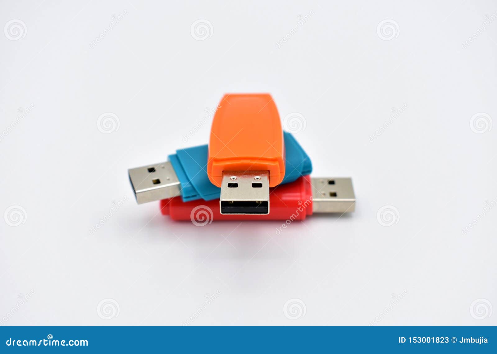USB Flash Memory Drives with Colours, Orange, Blue and Red, on a White ...
