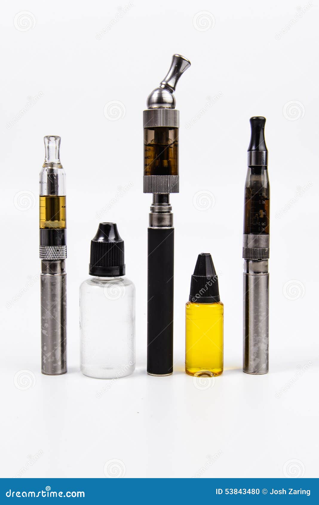 Three Vape E-Cig and Three Vape Juice Bottles Stock Photo - Image of ...