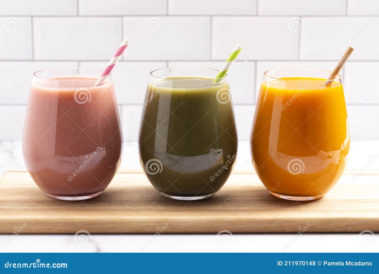 Three Varieties of Healthy Smoothies on a Kitchen Cabinet Stock Photo ...