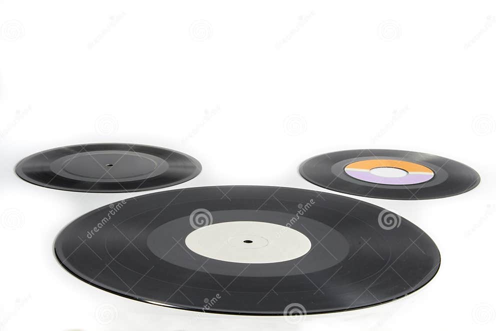 Three Vinyl Records of Different Sizes on White Background Stock Image ...