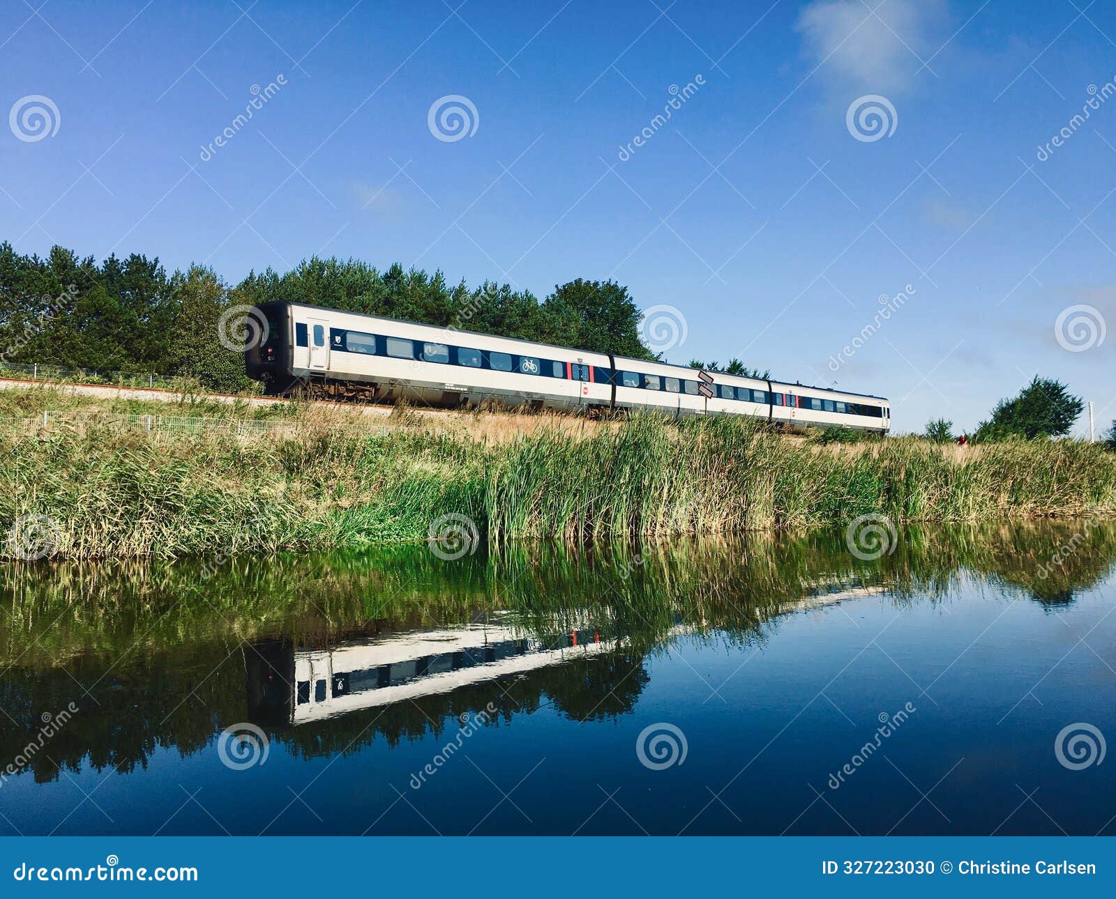 Train in Denmark by water editorial image. Image of danish - 327223030