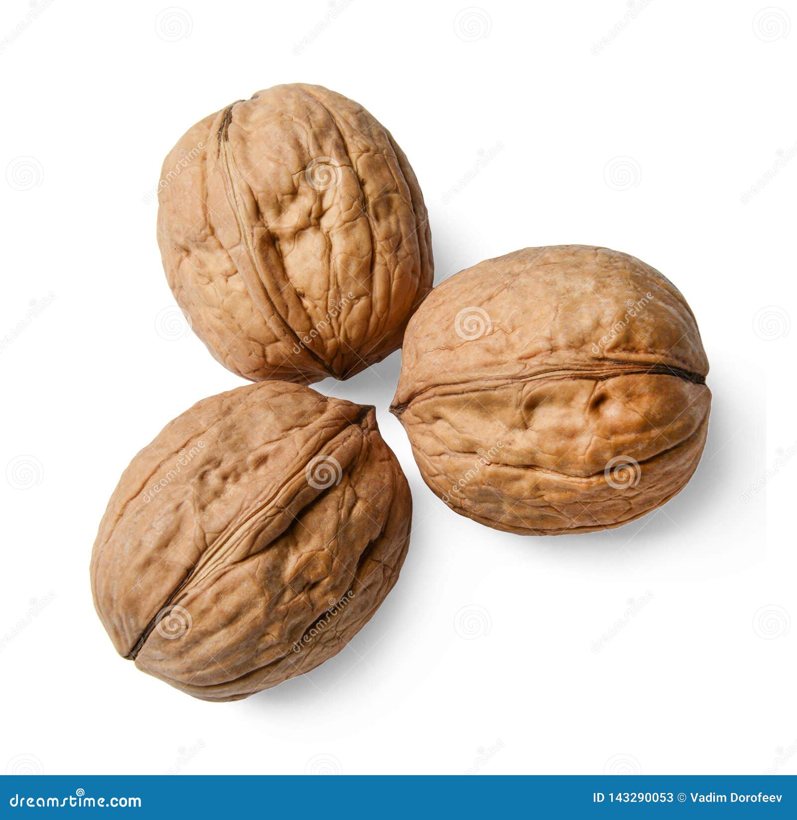 Three Walnuts on a White Isolated Background. Close-up. Top View. Stock ...