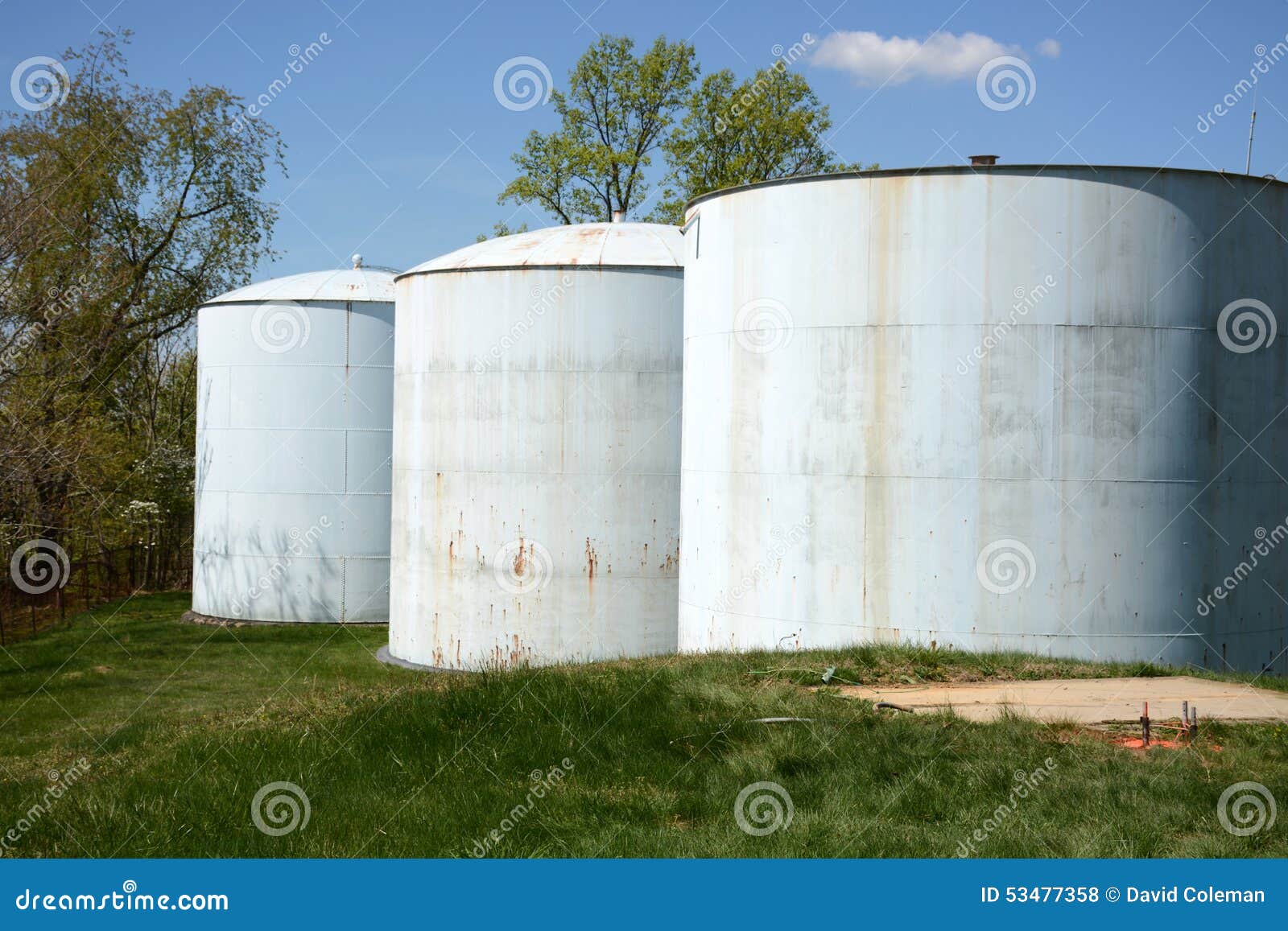 Three water tanks stock photo. Image of blue, metal, three - 53477358
