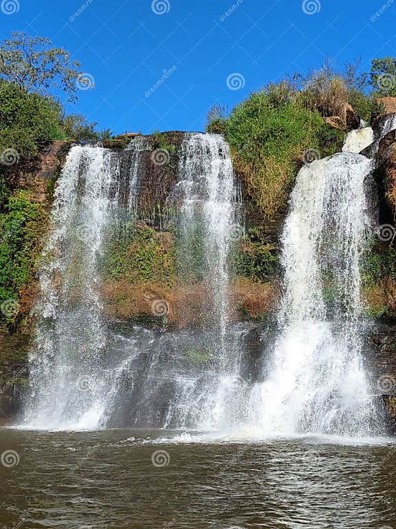 Three Waterfalls on a Day with a Blue Sky Behind Stock Photo - Image of ...