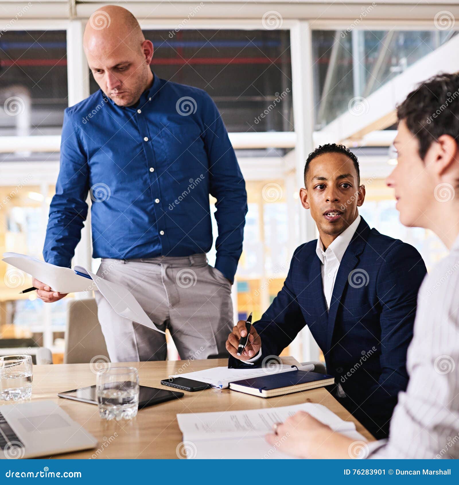 Three Well Dressed, Dynamic Programmers Working Together on Assignment ...