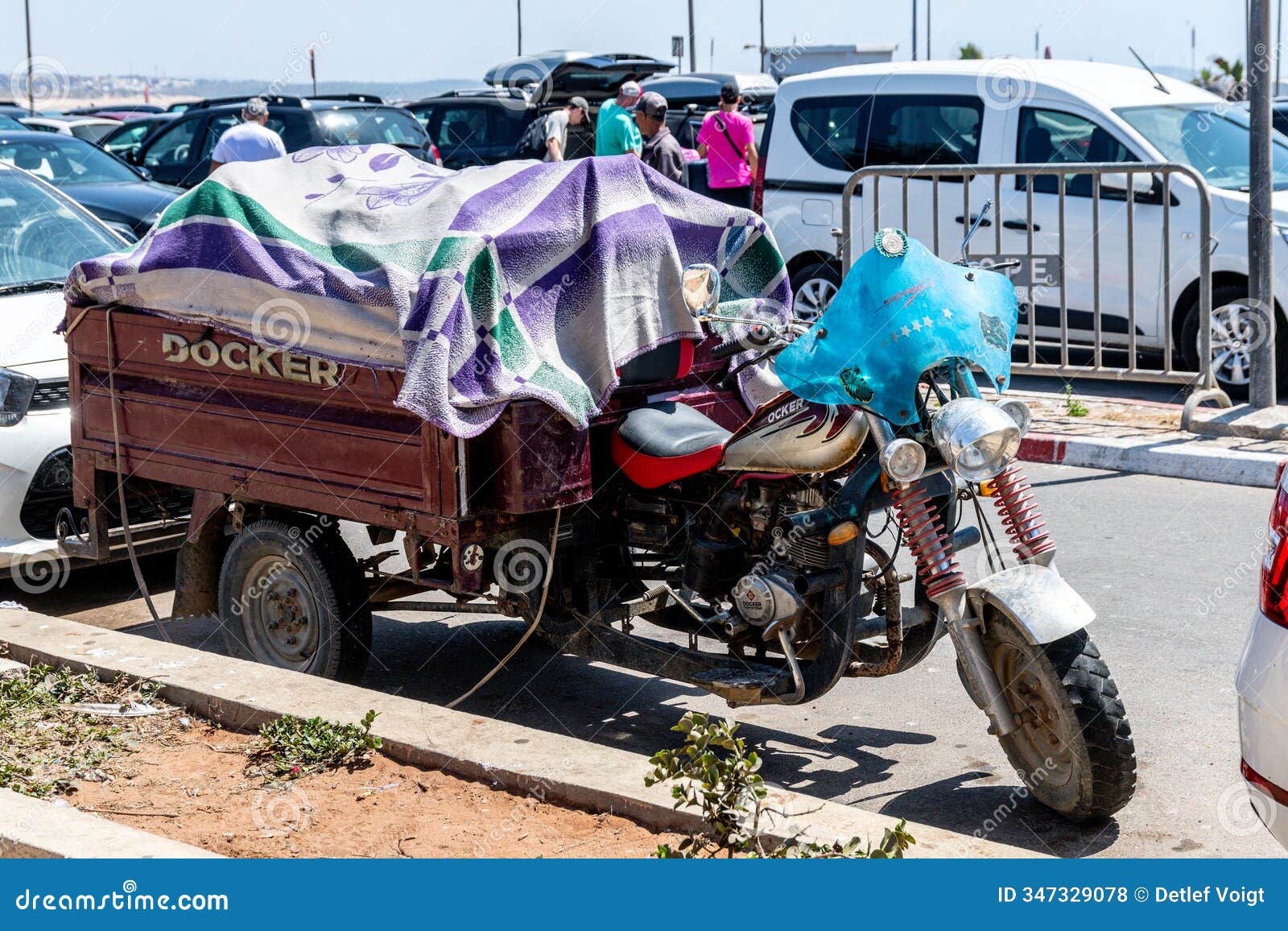 Three-Wheeled Docker Transport Vehicle Parked Under Blanket in ...