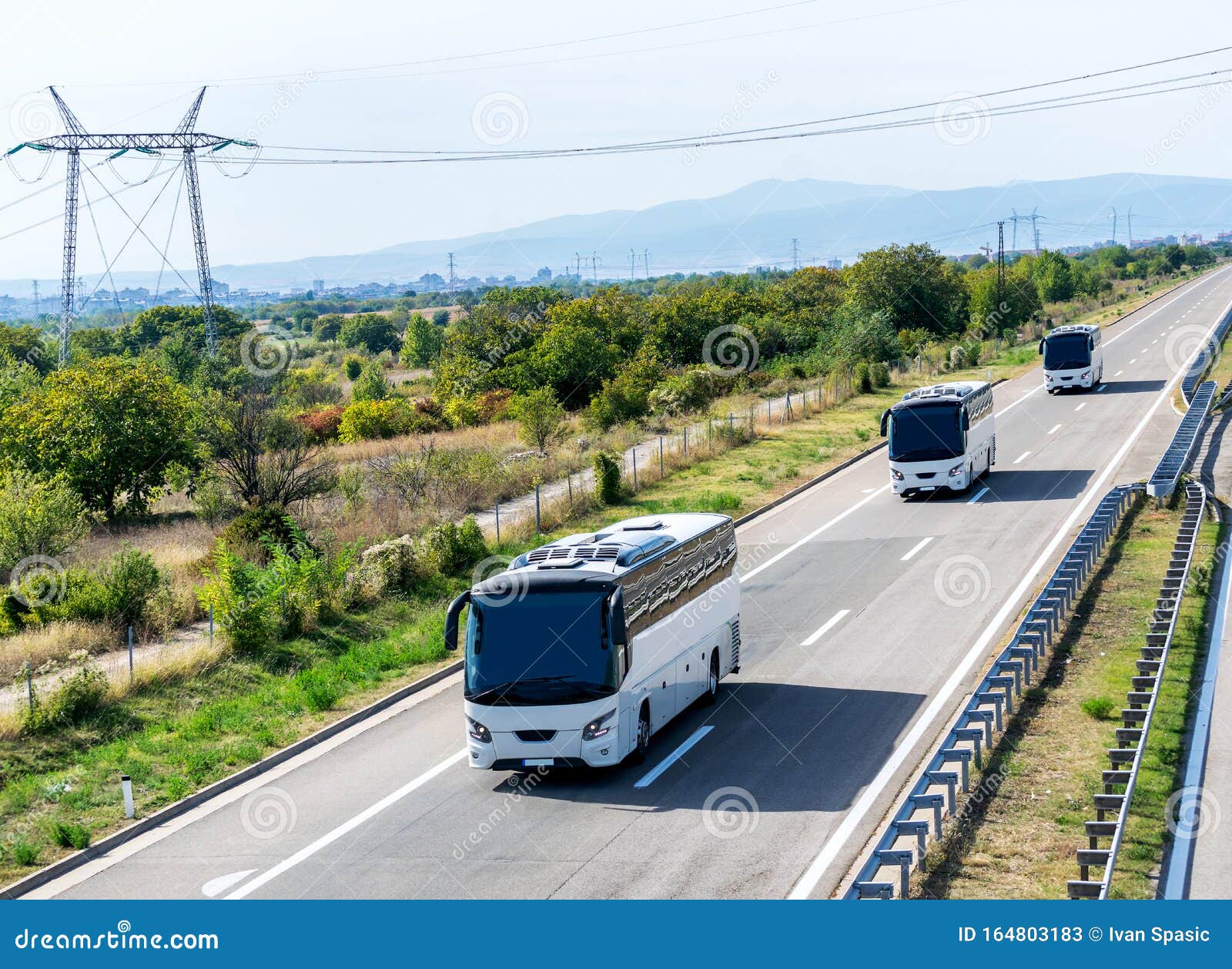 Three White Buses in Line on a Country Highway Stock Image - Image of ...