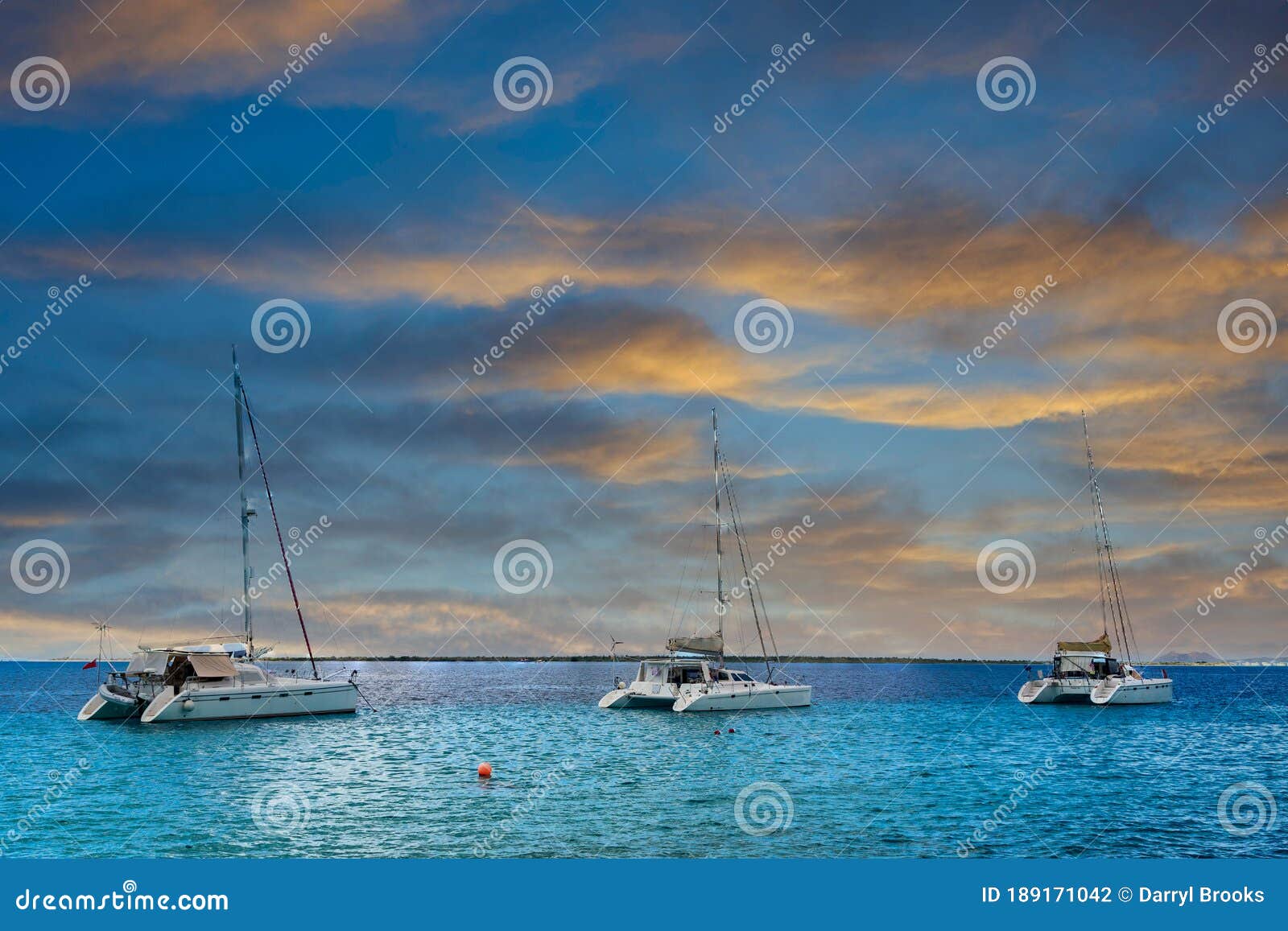 Three White Catamarans in Belize Dusk Stock Photo - Image of ocean ...