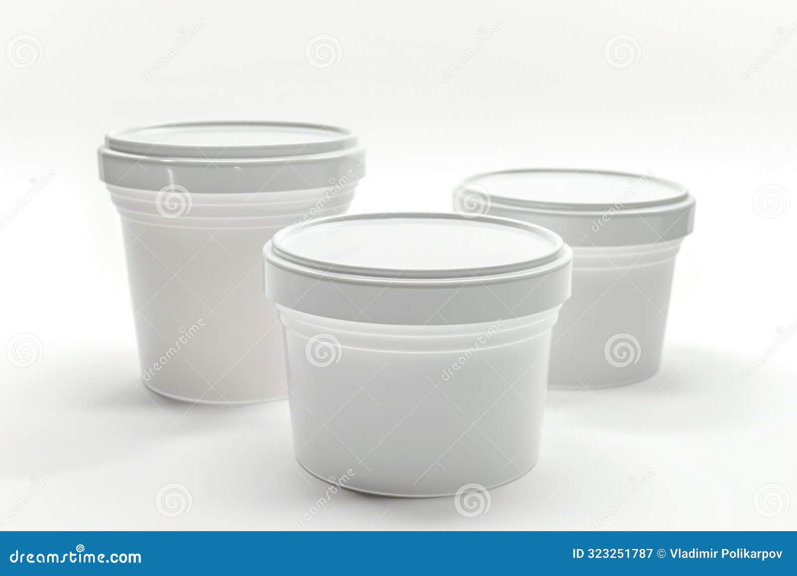 Three White Containers with Lids Placed on a White Surface Stock Image ...