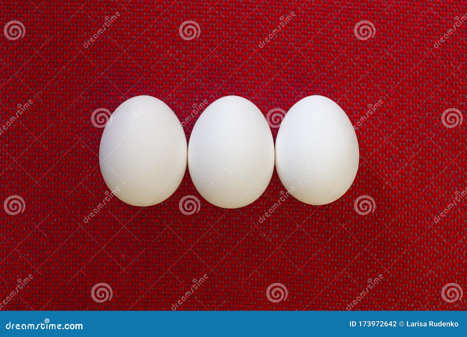 Three White Egg on the Red Background in Center Stock Photo - Image of ...