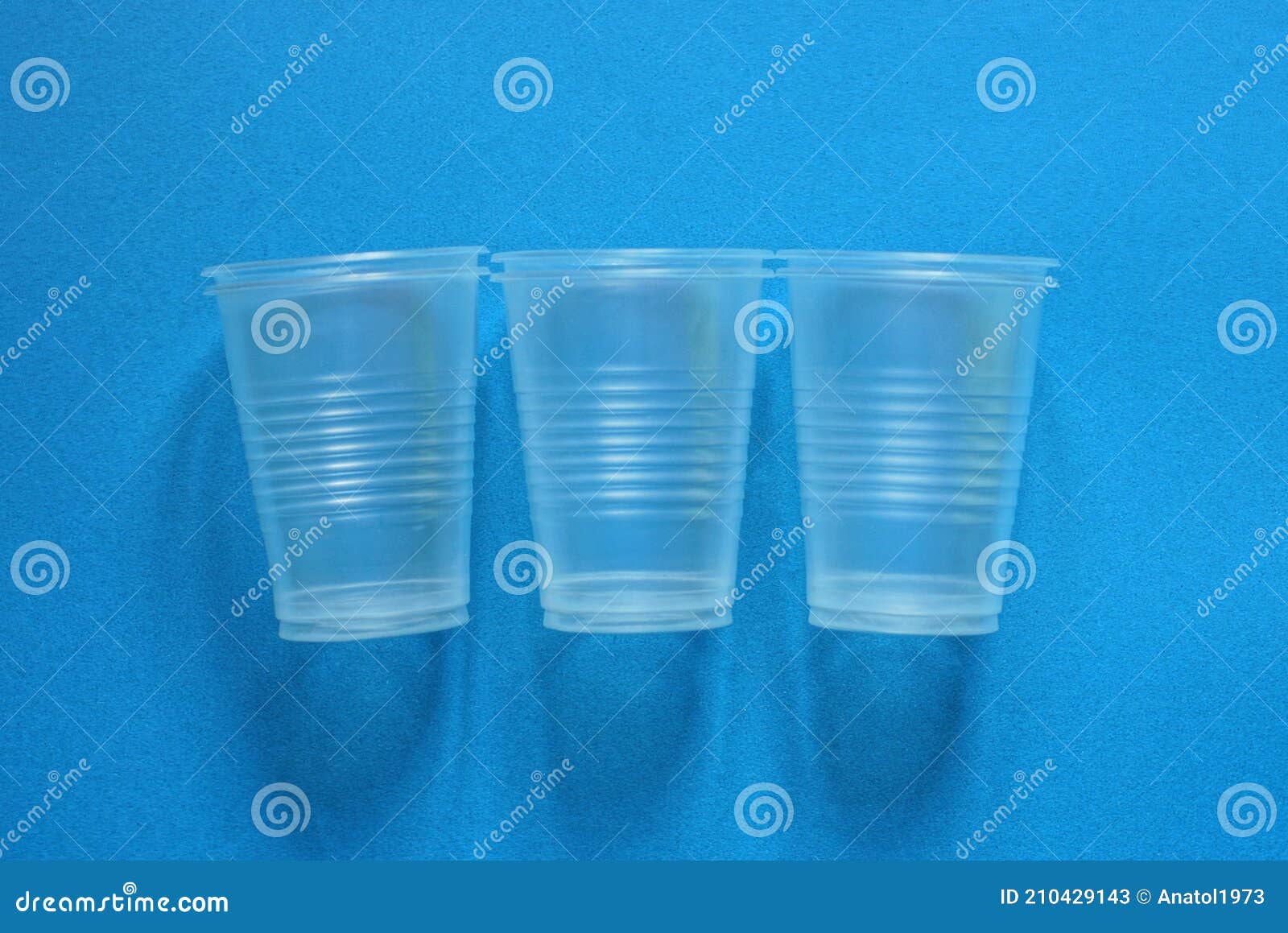 A Three of White Empty Transparent Plastic Glasses Stock Image - Image ...