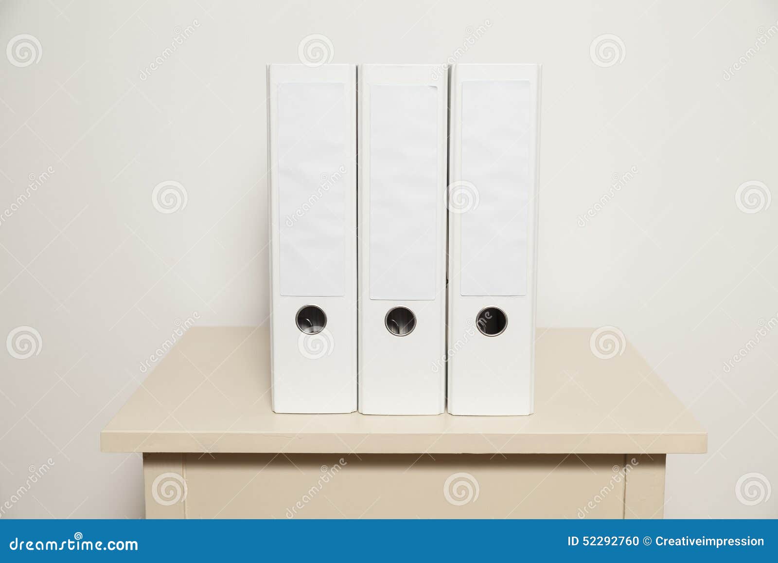 Red And White Folders With Documents Lying On The Desktop Next To A ...