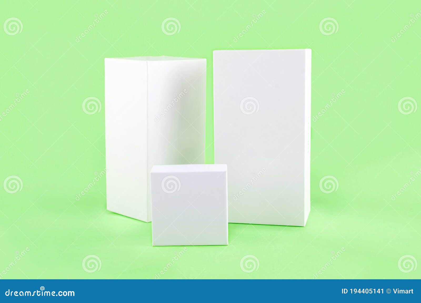 Three White Geometric Figure, a Rectangular with Shadows on a Light ...