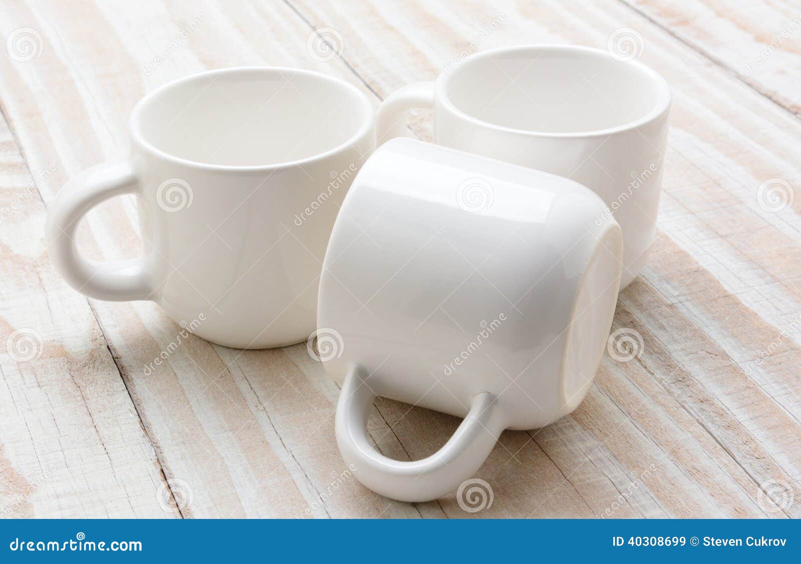 Three White Mugs Closeup stock image. Image of wood, objects - 40308699