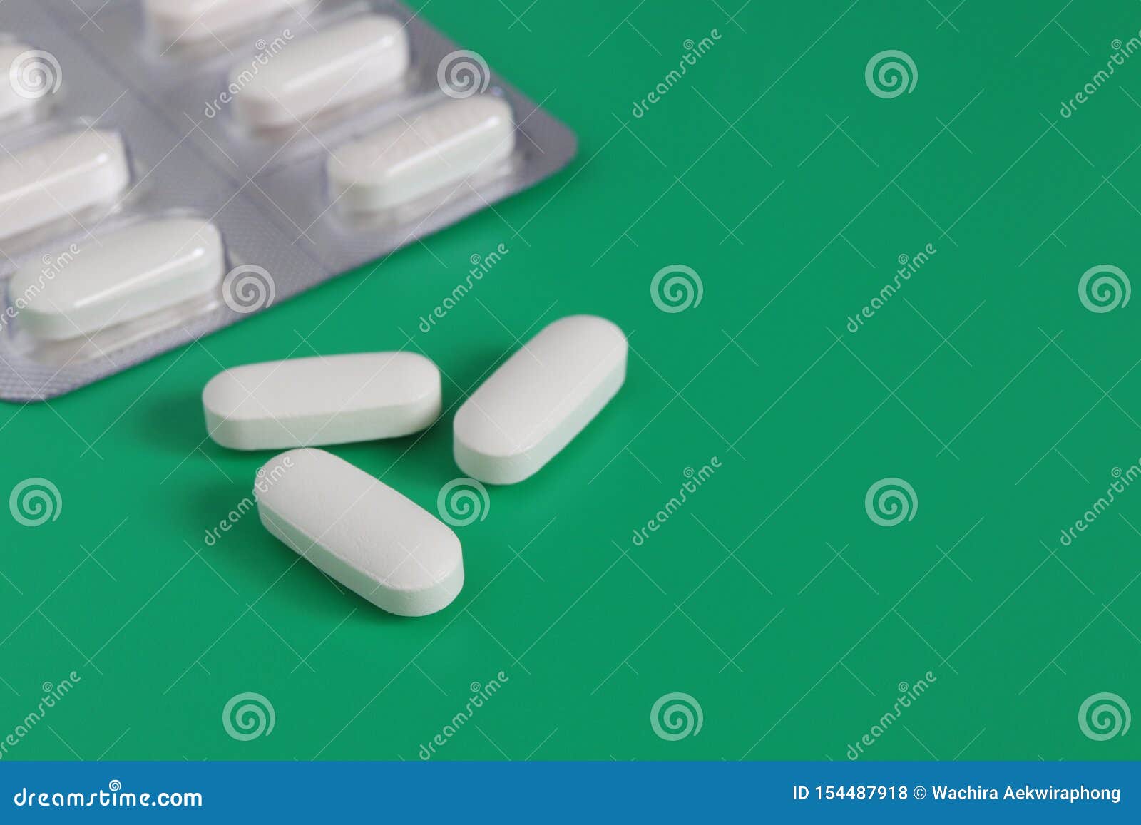 White Pill On Green Background Stock Photography | CartoonDealer.com ...