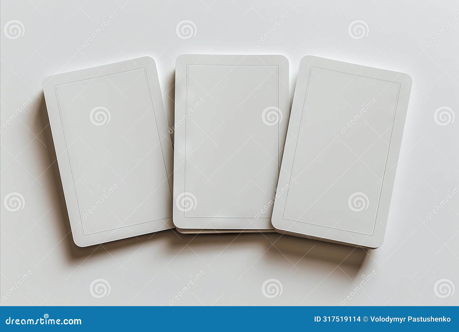 Three White Playing Cards on a White Surface Stock Photo - Image of ...