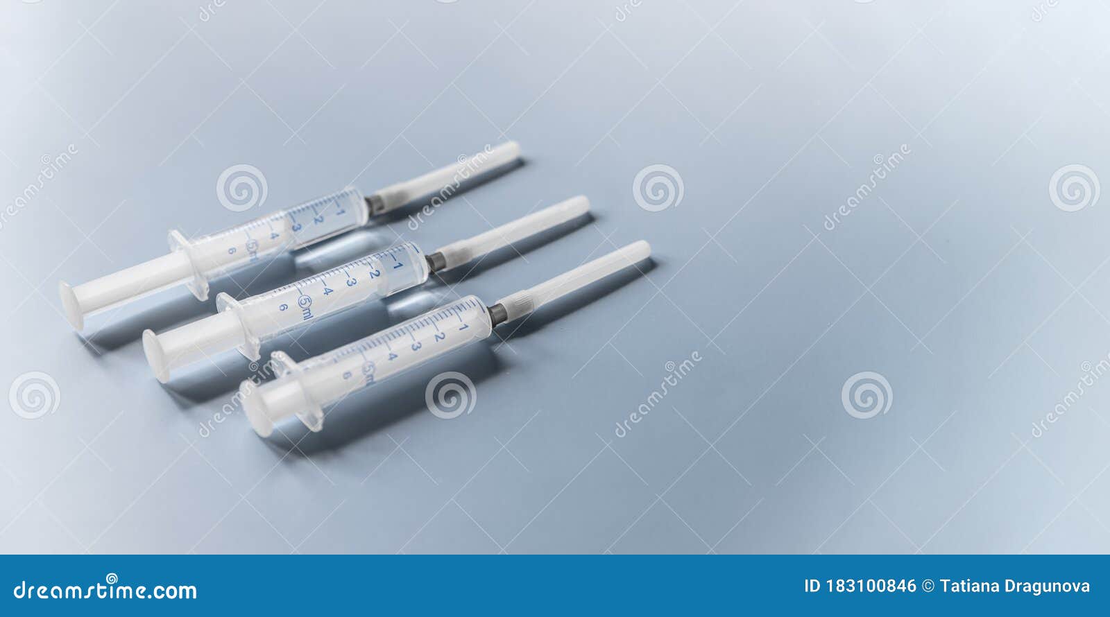Three White Syringes Empty and Full on a Blue Background. Medicine and ...