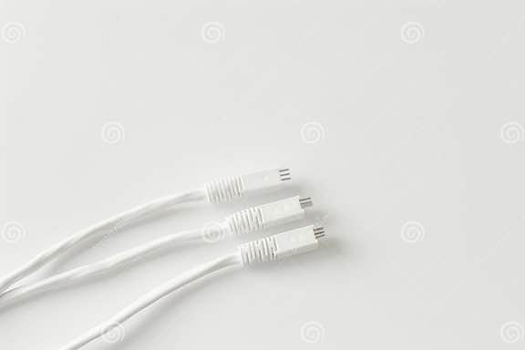 Three White USB Cables on White Background Technology Concept Stock ...