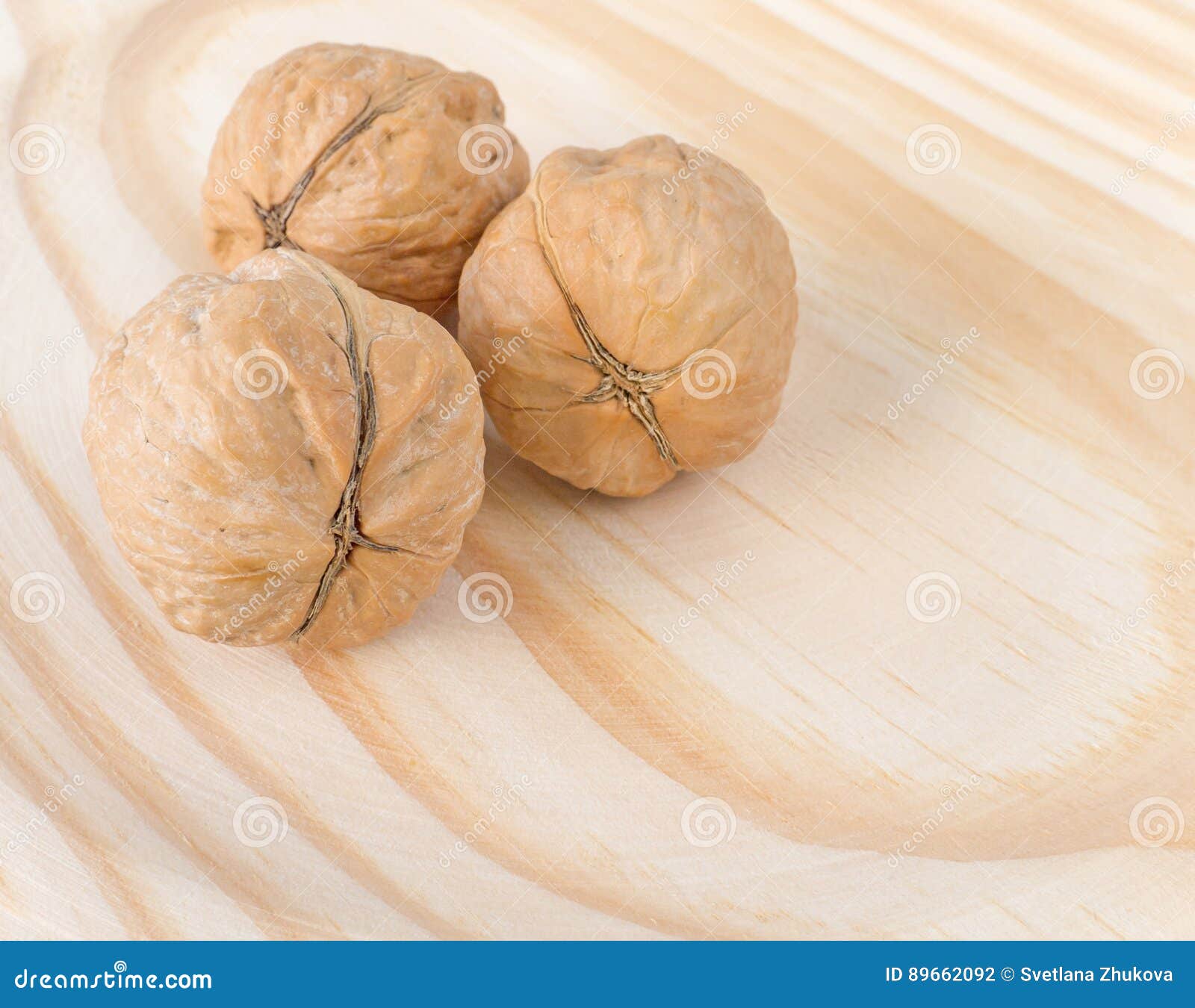 Three whole walnuts stock photo. Image of organic, gastronomy - 89662092