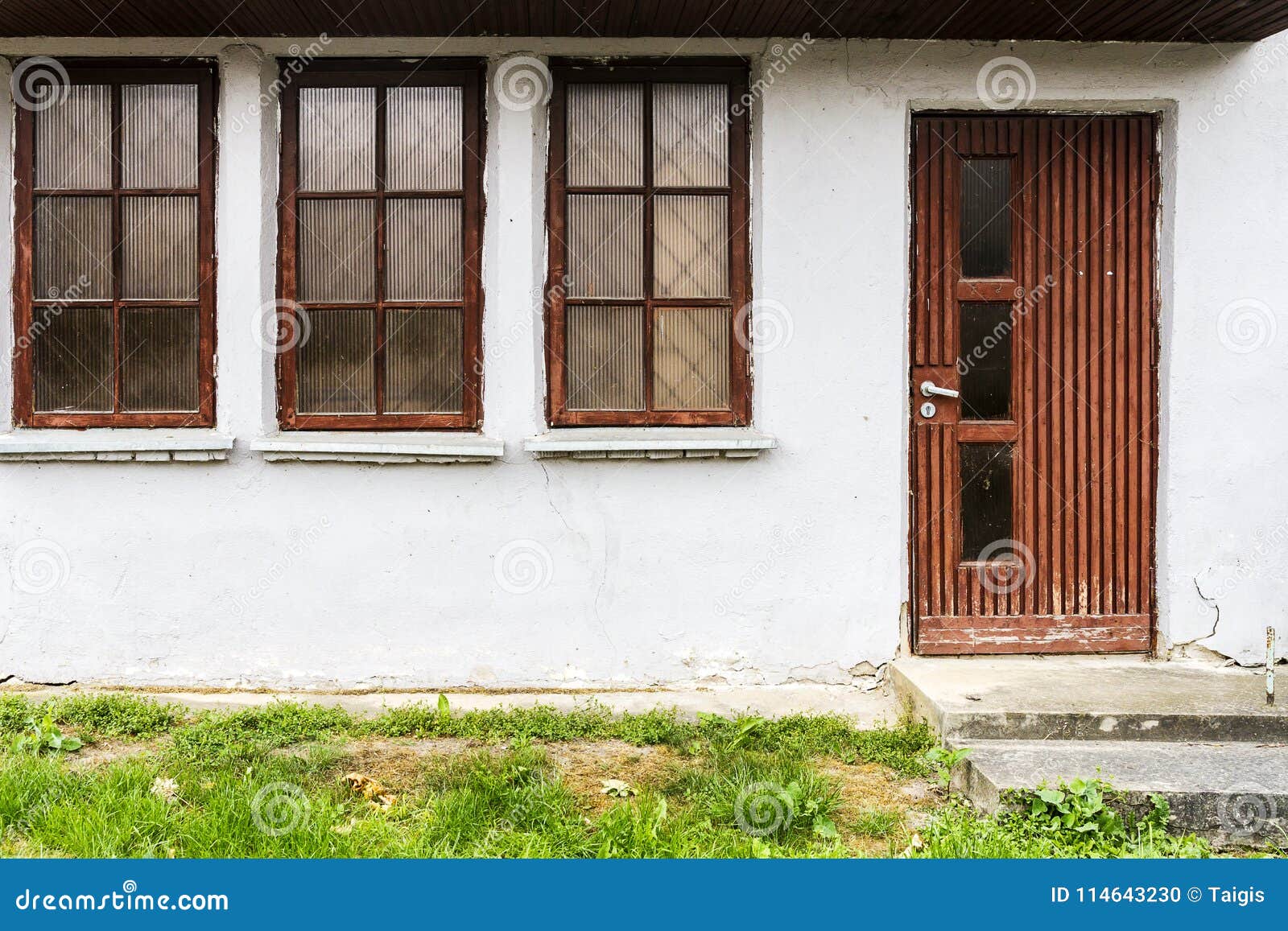 Three windows and a door stock photo. Image of door - 114643230