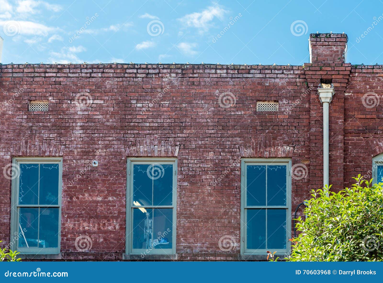 Three Windows in Old Brick Building Stock Photo - Image of facade ...