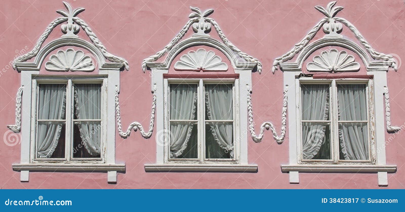 Three Windows on Pink House Wall with Stucco Ornate Stock Image - Image ...