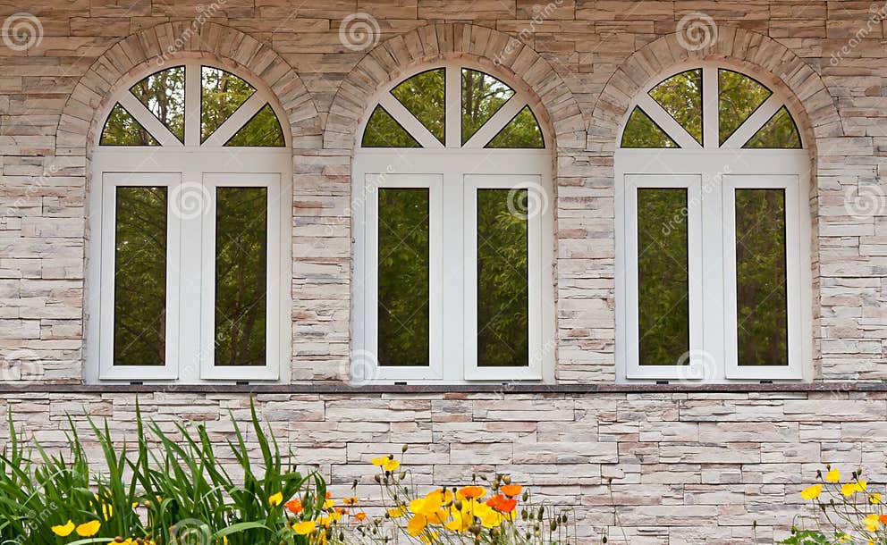 Three Windows in the Stone Wall Stock Photo - Image of brown, building ...