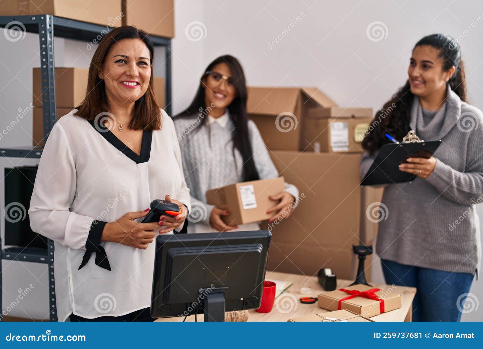 Three Woman Ecommerce Business Workers Scanning Package Working at ...