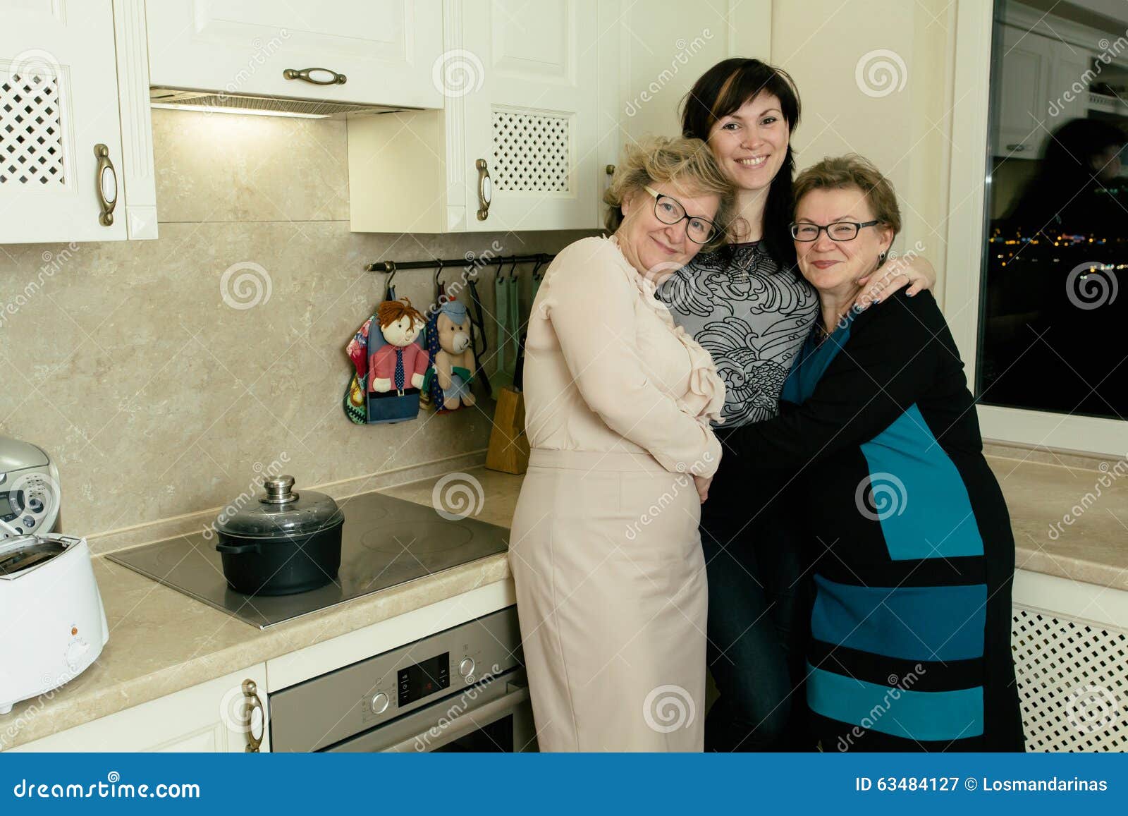 Three woman in the kitchen stock image. Image of women - 63484127