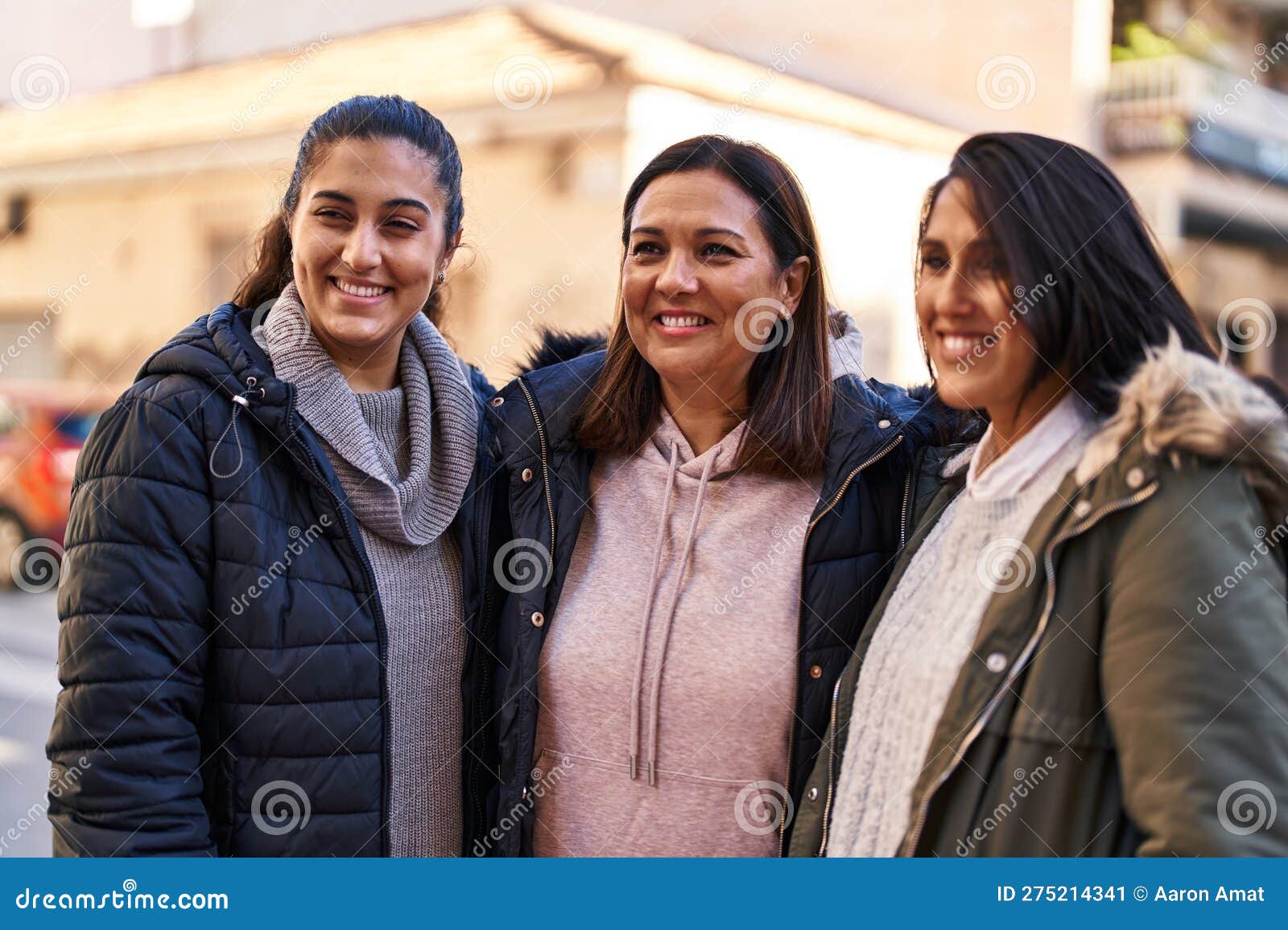Three Woman Mother And Daughters Standing Together At Street Stock