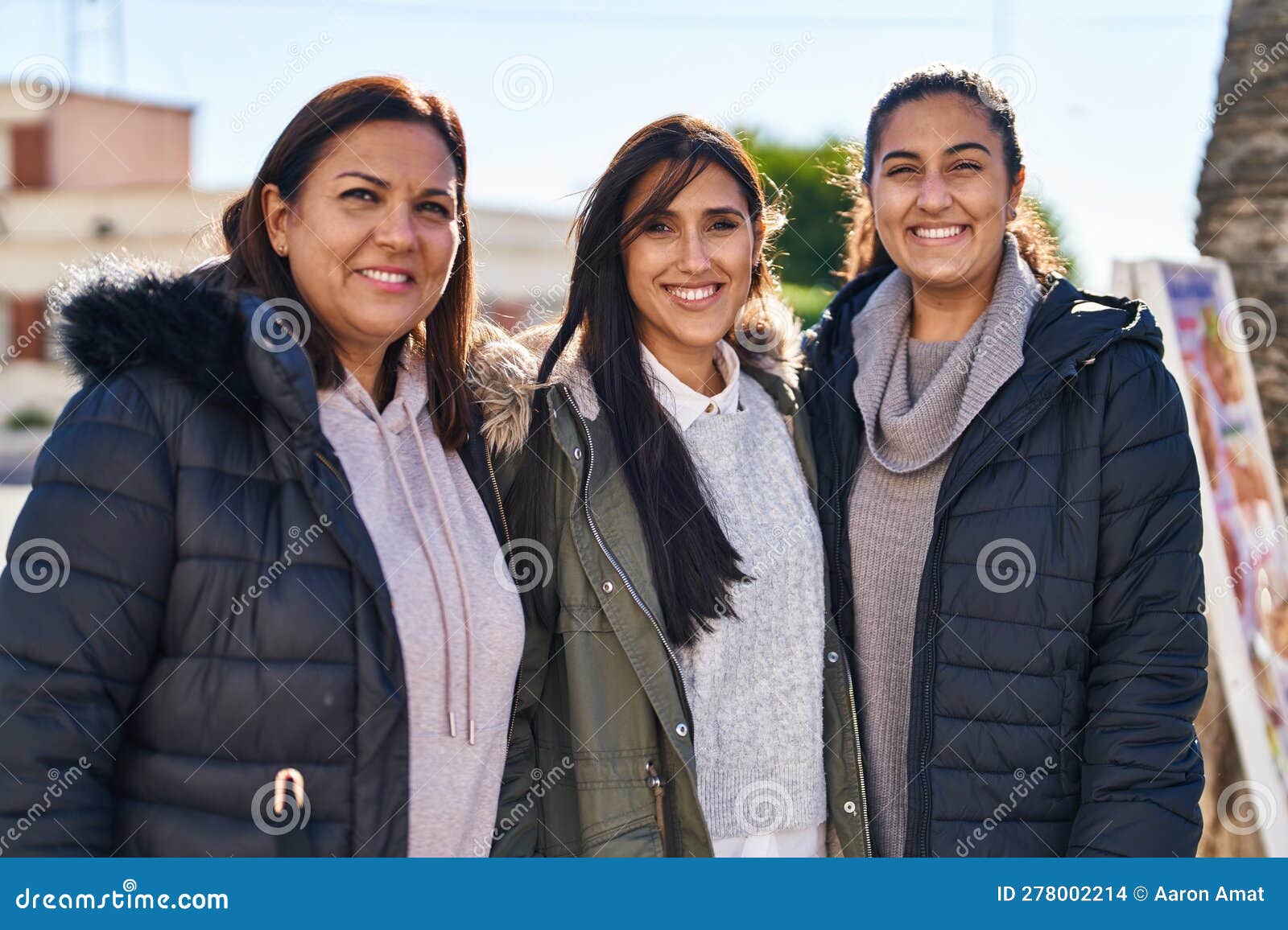 Three Woman Mother And Daughters Standing Together At Street Stock