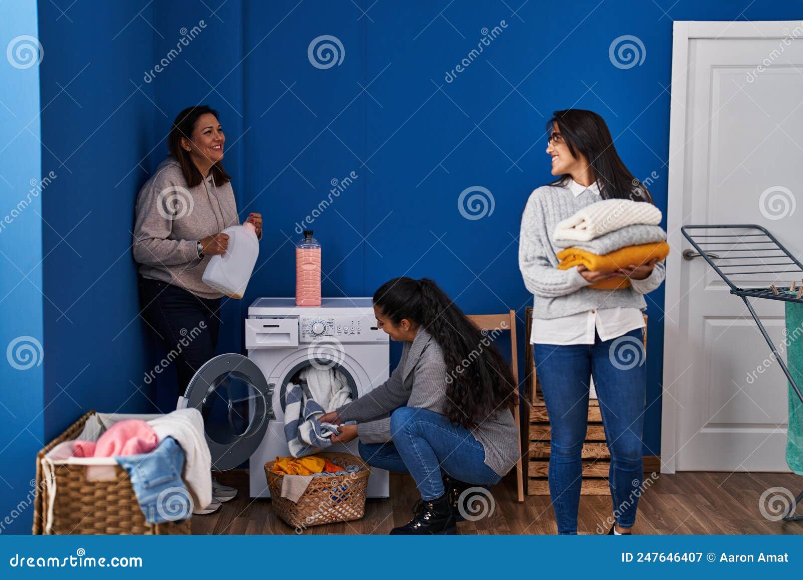 Three Woman Washing Clothes at Laundry Room Stock Image - Image of ...