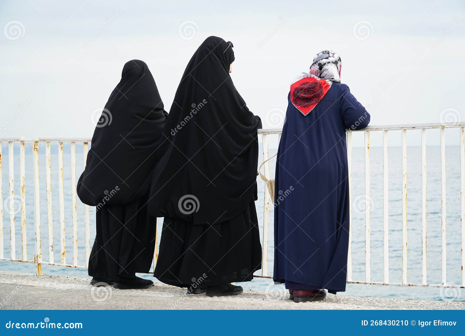 Three Women in a Burqa Look at the Sea Stock Photo - Image of spring ...