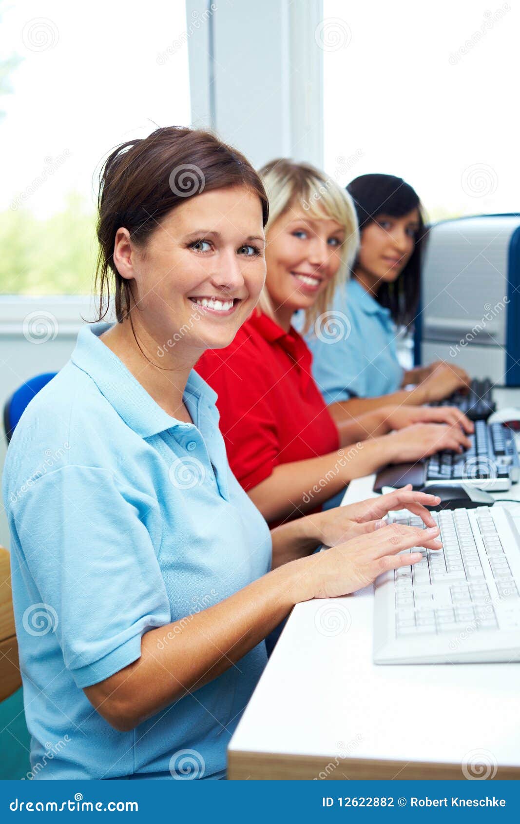 Three women with computers stock photo. Image of internet - 12622882